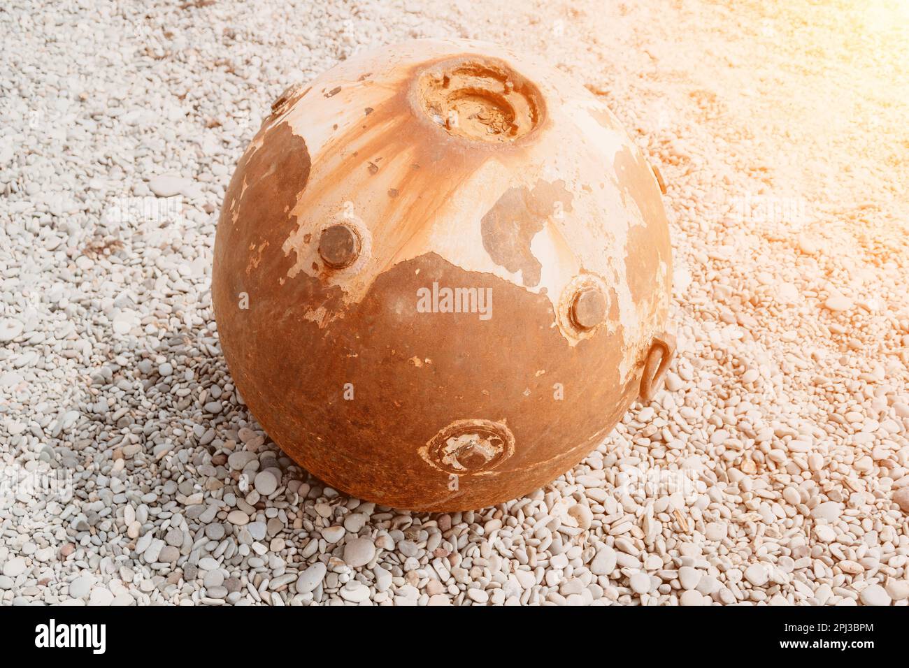 Old rusty sea mine on the beach Stock Photo - Alamy