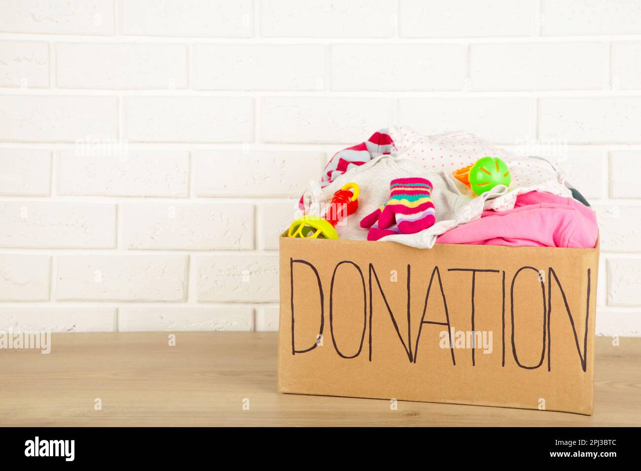 Kid donation box hi-res stock photography and images - Alamy