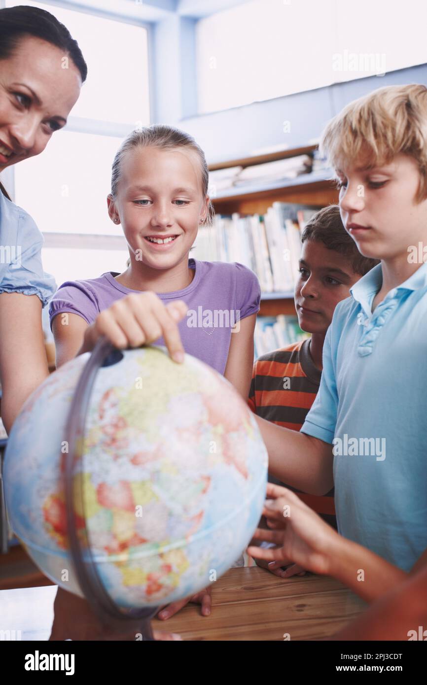 What is this country called. A group of schoolchildren learning about ...
