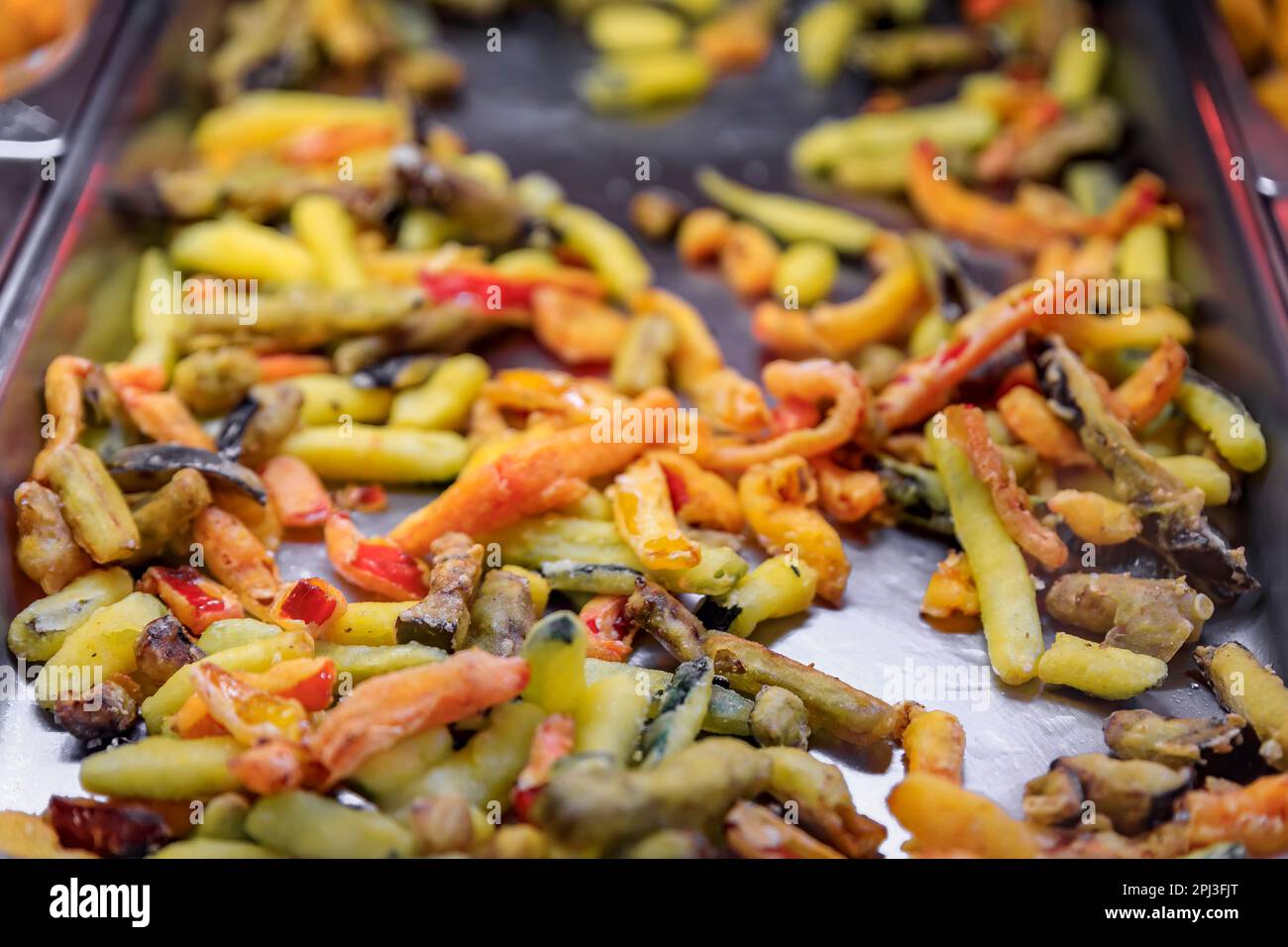 Fritto misto, Italian street food mix of fried vegetables for sale at a ...