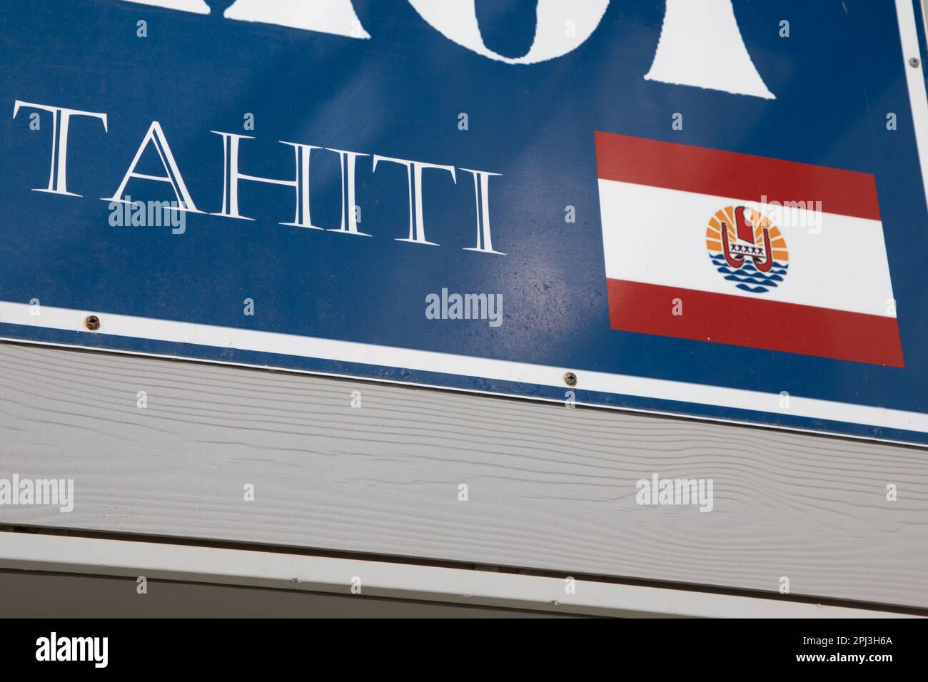 French Polynesia red white flag and text sign tahiti panel Stock Photo ...