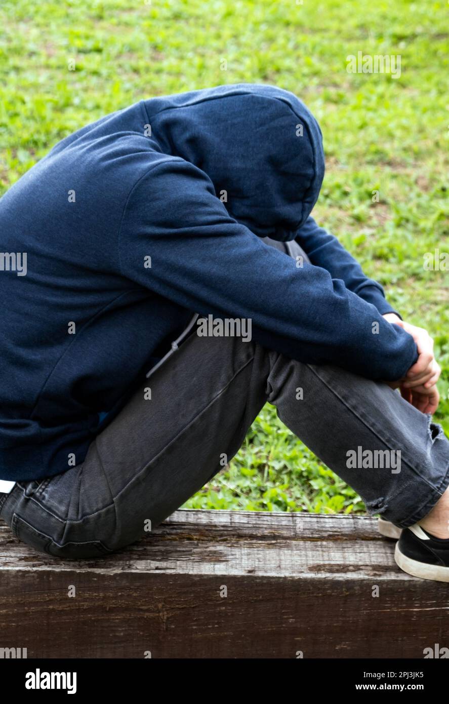 Unhappy sad lonely hoodie hi-res stock photography and images - Alamy
