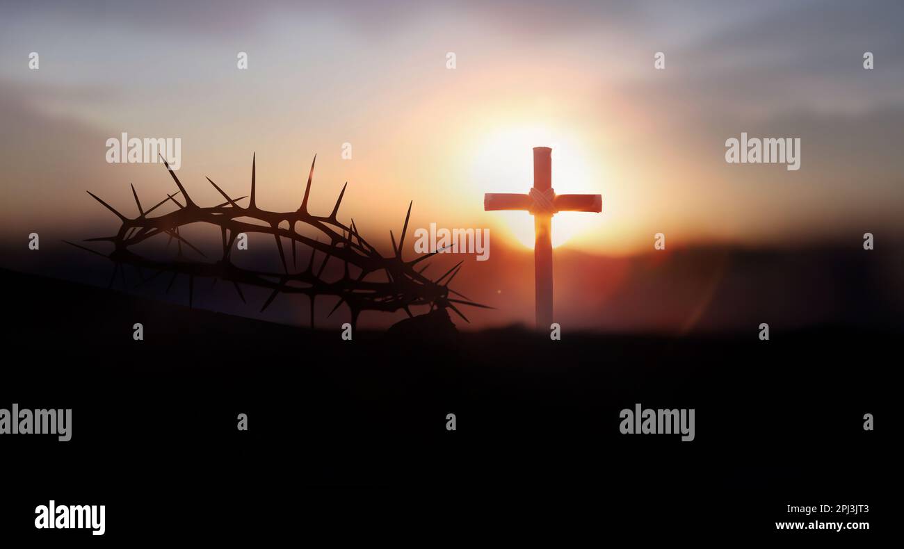 The sunset sky, the cross symbolizing the suffering and resurrection of ...