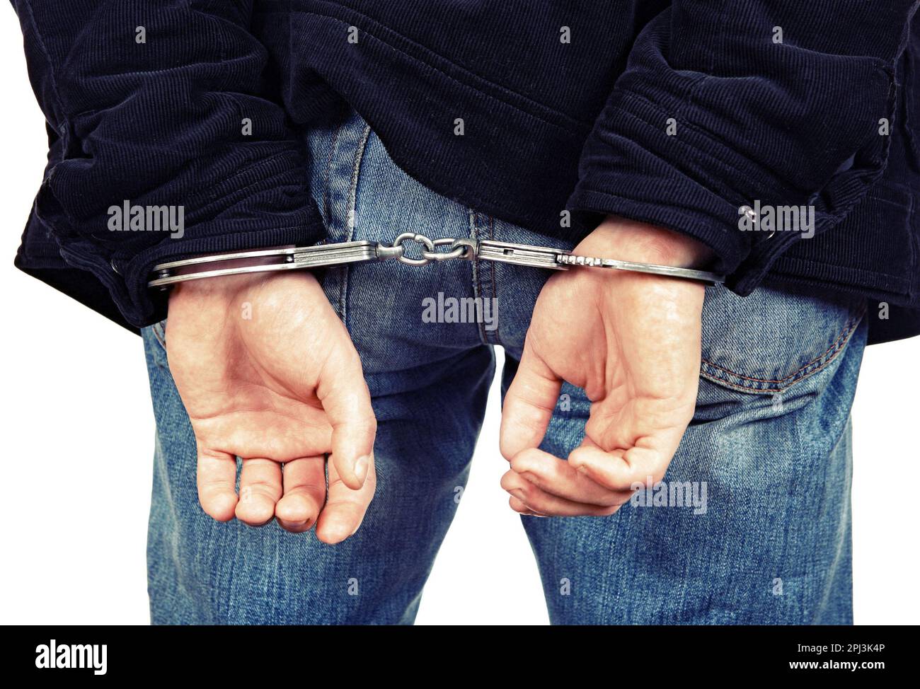 Person in handcuffs hi-res stock photography and images - Alamy