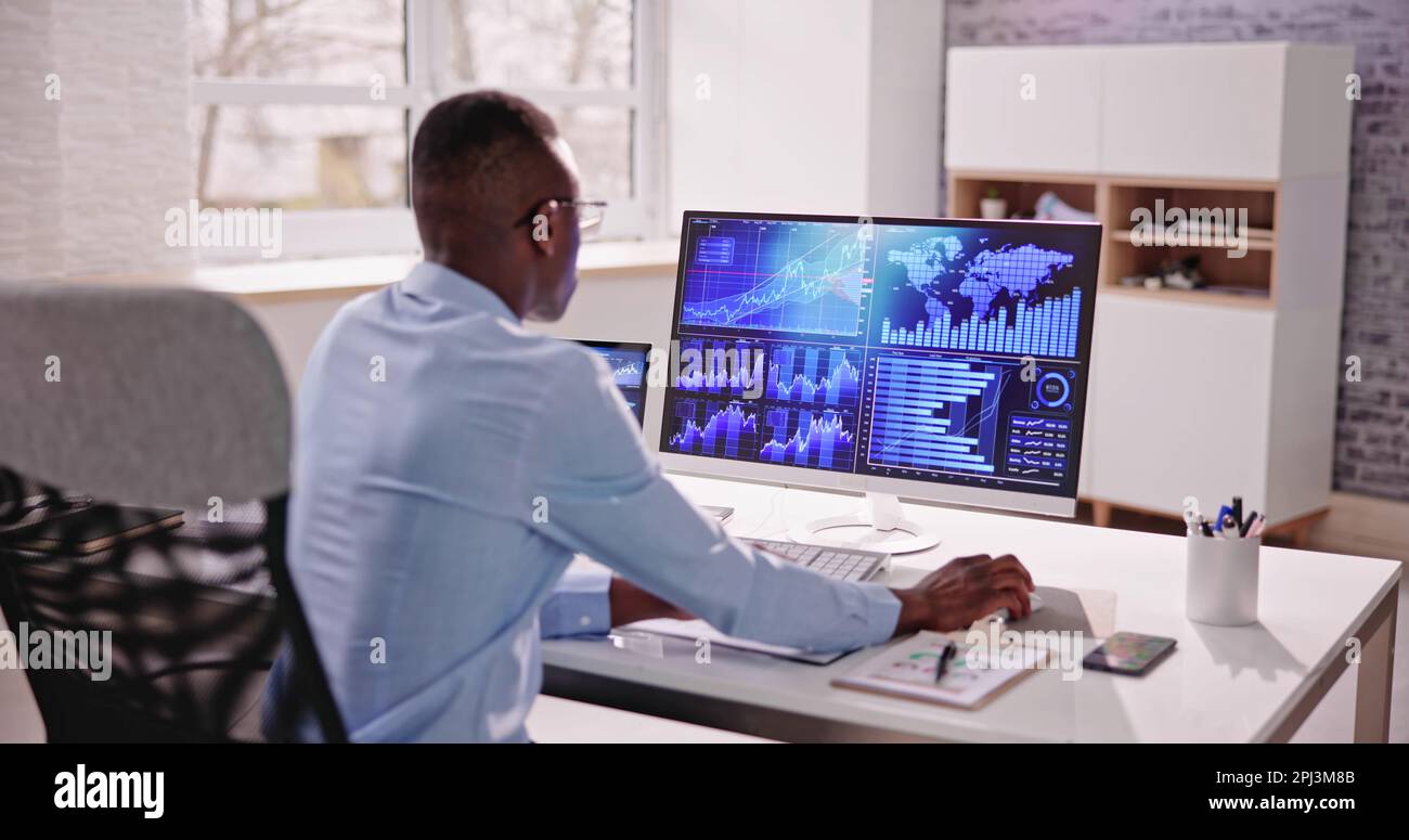 African American Data Analyst Using Data Analytics KPI Dashboard Stock ...