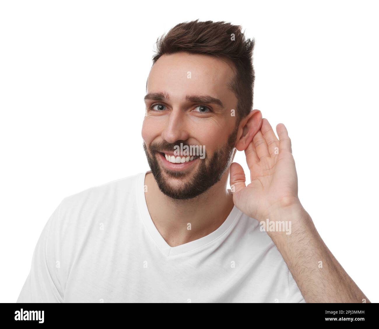 Man showing hand to ear gesture on white background Stock Photo - Alamy