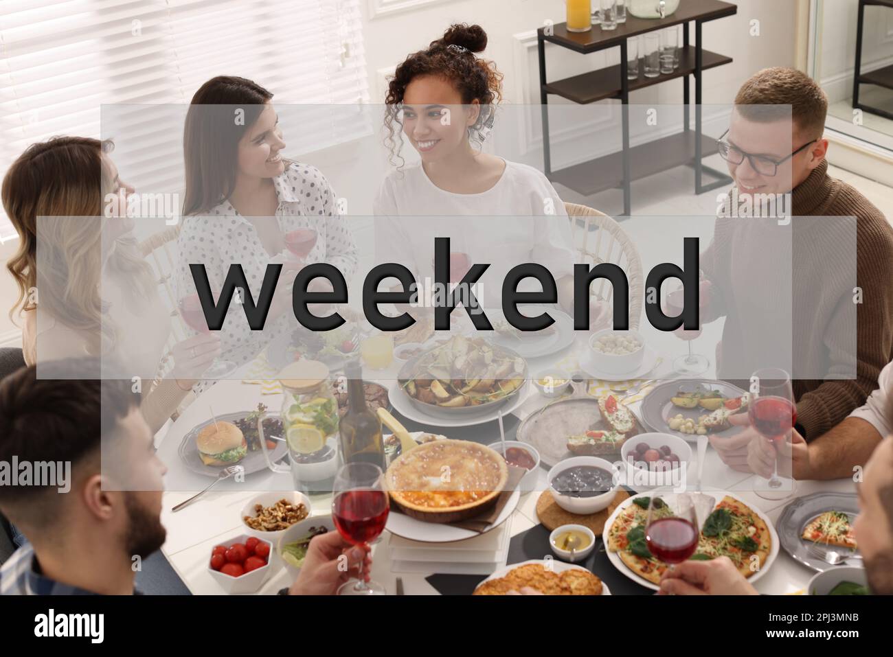 Hello Weekend. Group of friends having brunch together at table indoors Stock Photo - Alamy