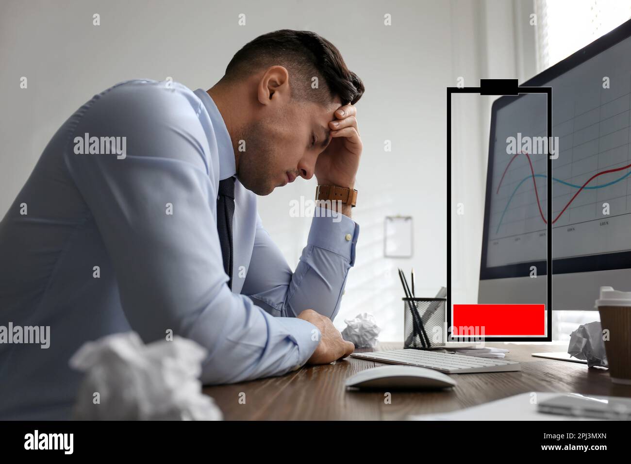 Illustration of discharged battery and tired man at workplace in office ...