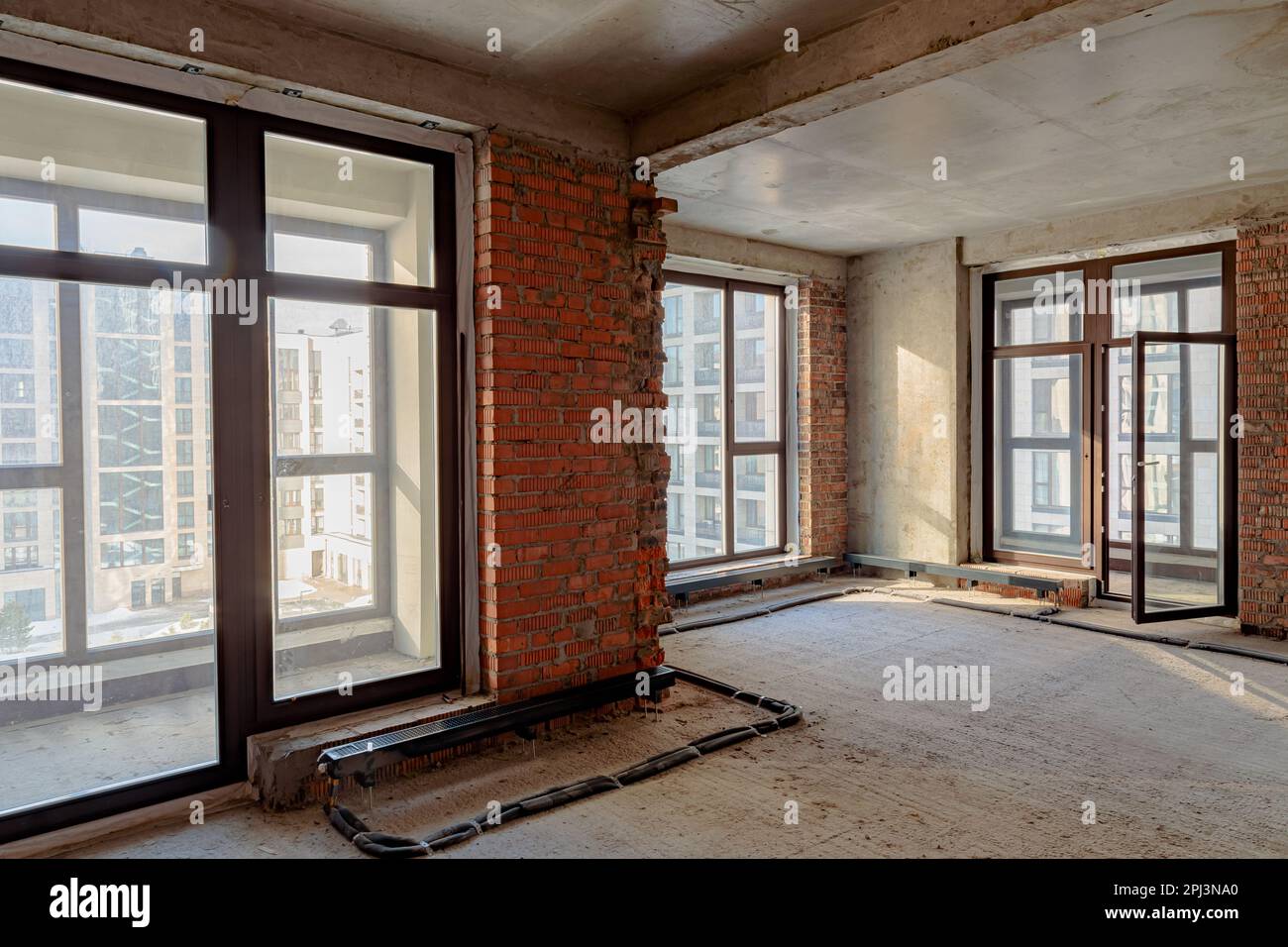 Repair and restoration of apartments. Red brick walls, concrete floors ...