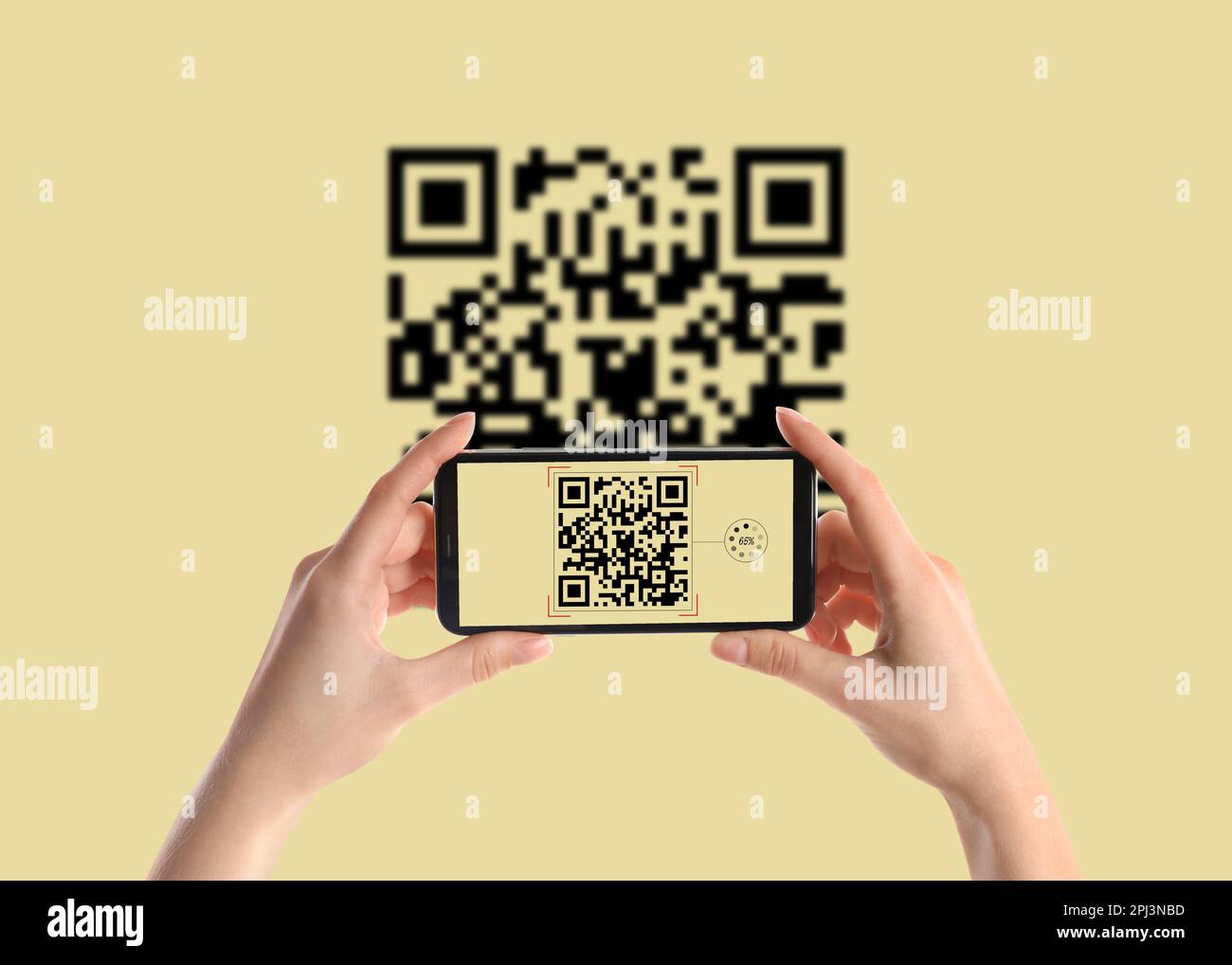 Woman scanning QR code with smartphone on beige background, closeup ...