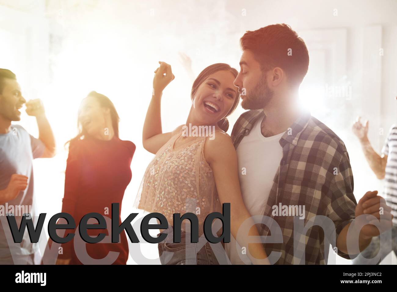Hello Weekend. Lovely young couple dancing together at party Stock ...