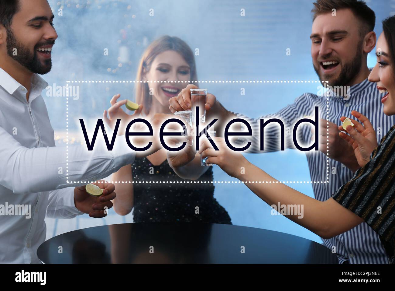 Hello Weekend. Young people toasting with shots at table in bar Stock ...