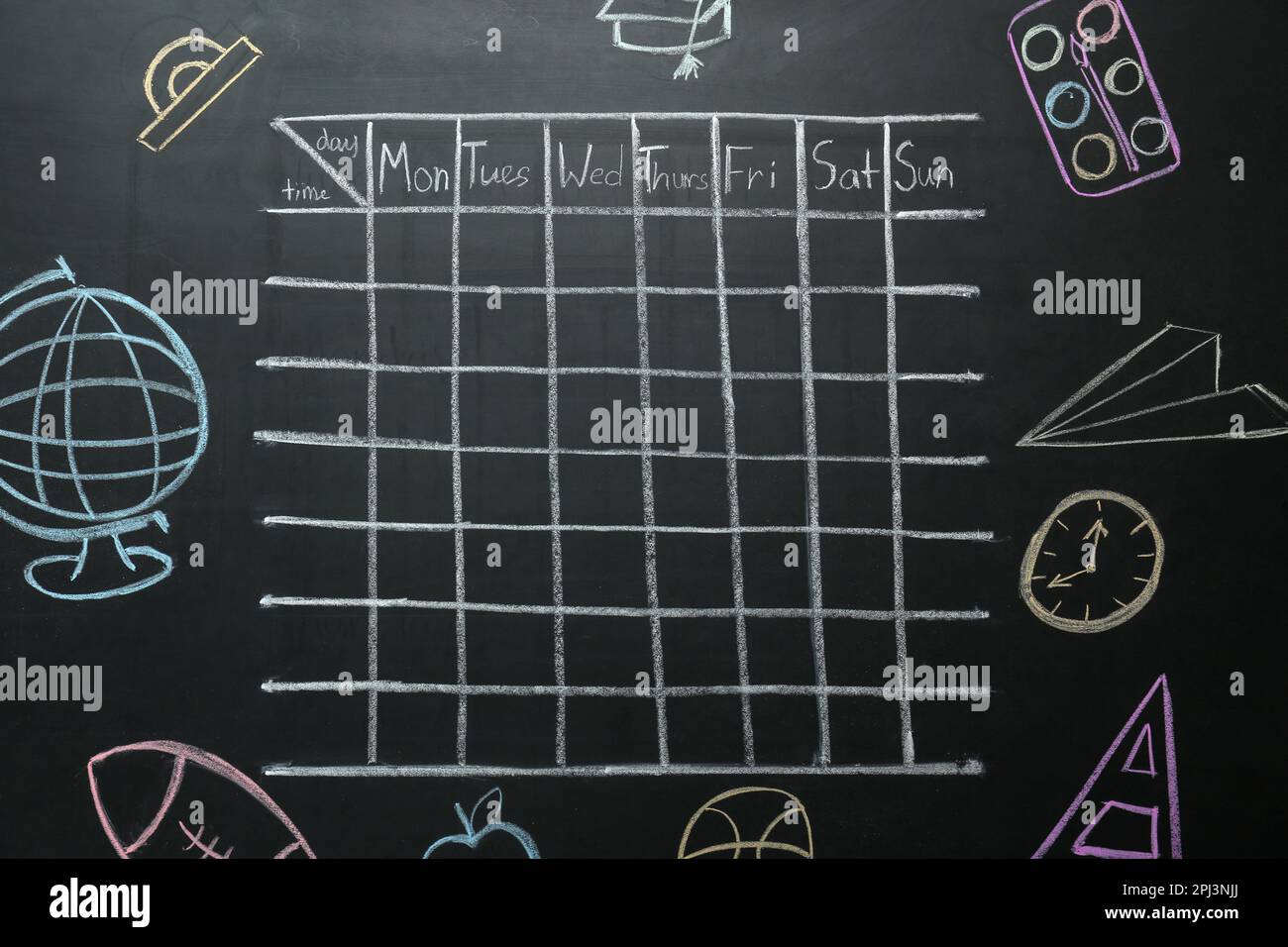 Weekly school timetable drawn on black chalkboard Stock Photo - Alamy
