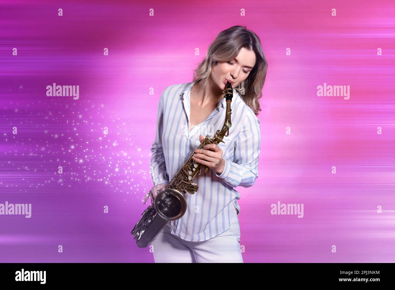 Beautiful young woman playing saxophone on pink background Stock Photo ...