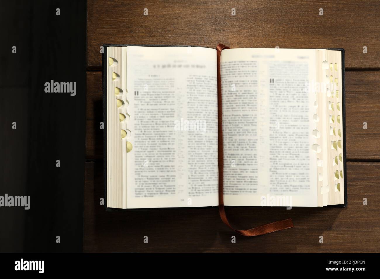 Open Bible on wooden table, top view. Christian religious book Stock ...