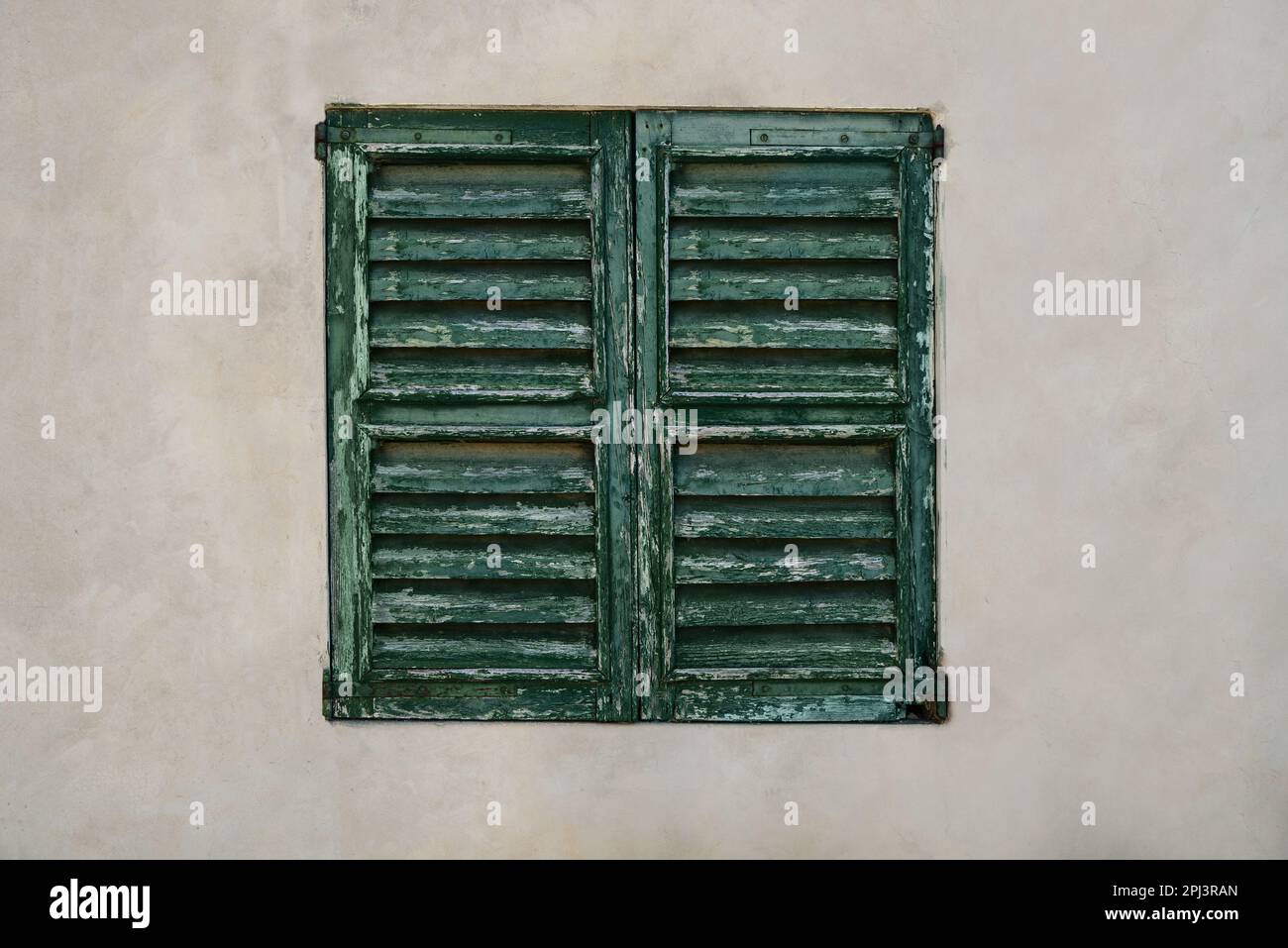Window with old wooden shutters on concrete wall Stock Photo - Alamy
