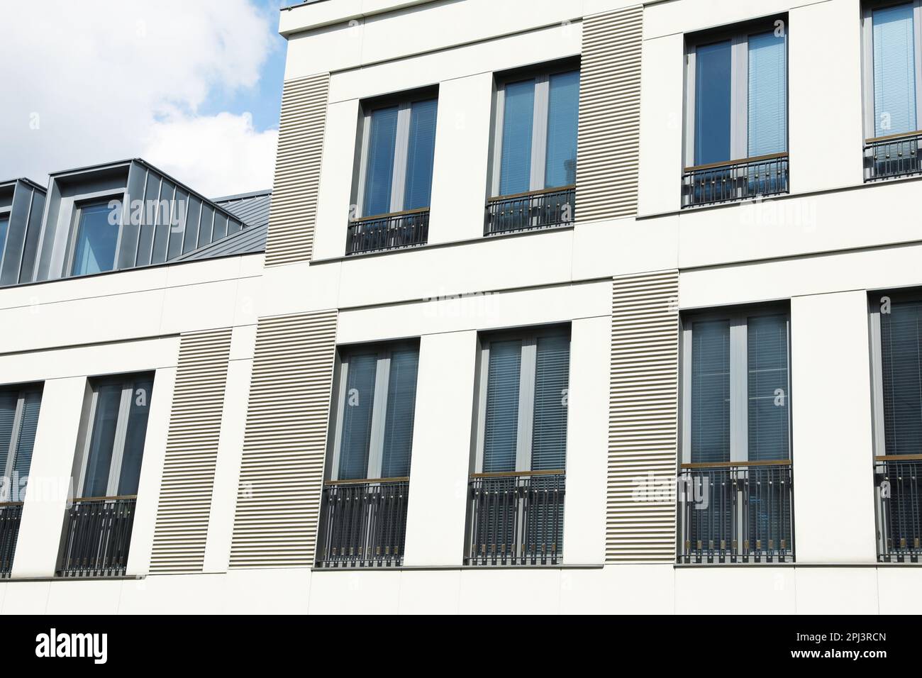 Building with big windows outdoors. Urban architecture Stock Photo - Alamy