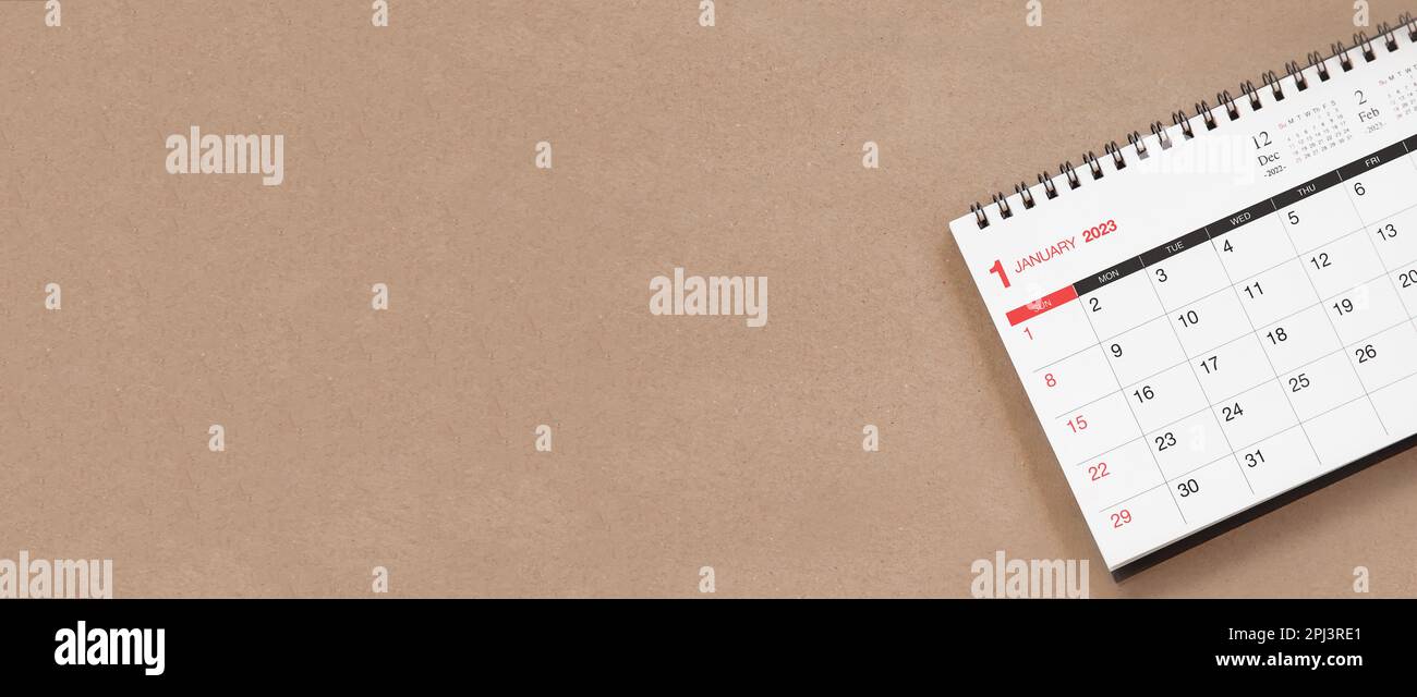 white calendar on brown background Stock Photo - Alamy