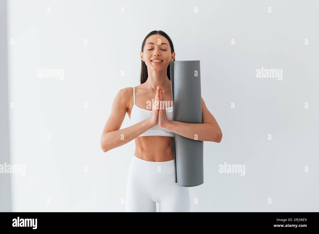 Young caucasian woman with slim body shape is indoors at daytime Stock ...