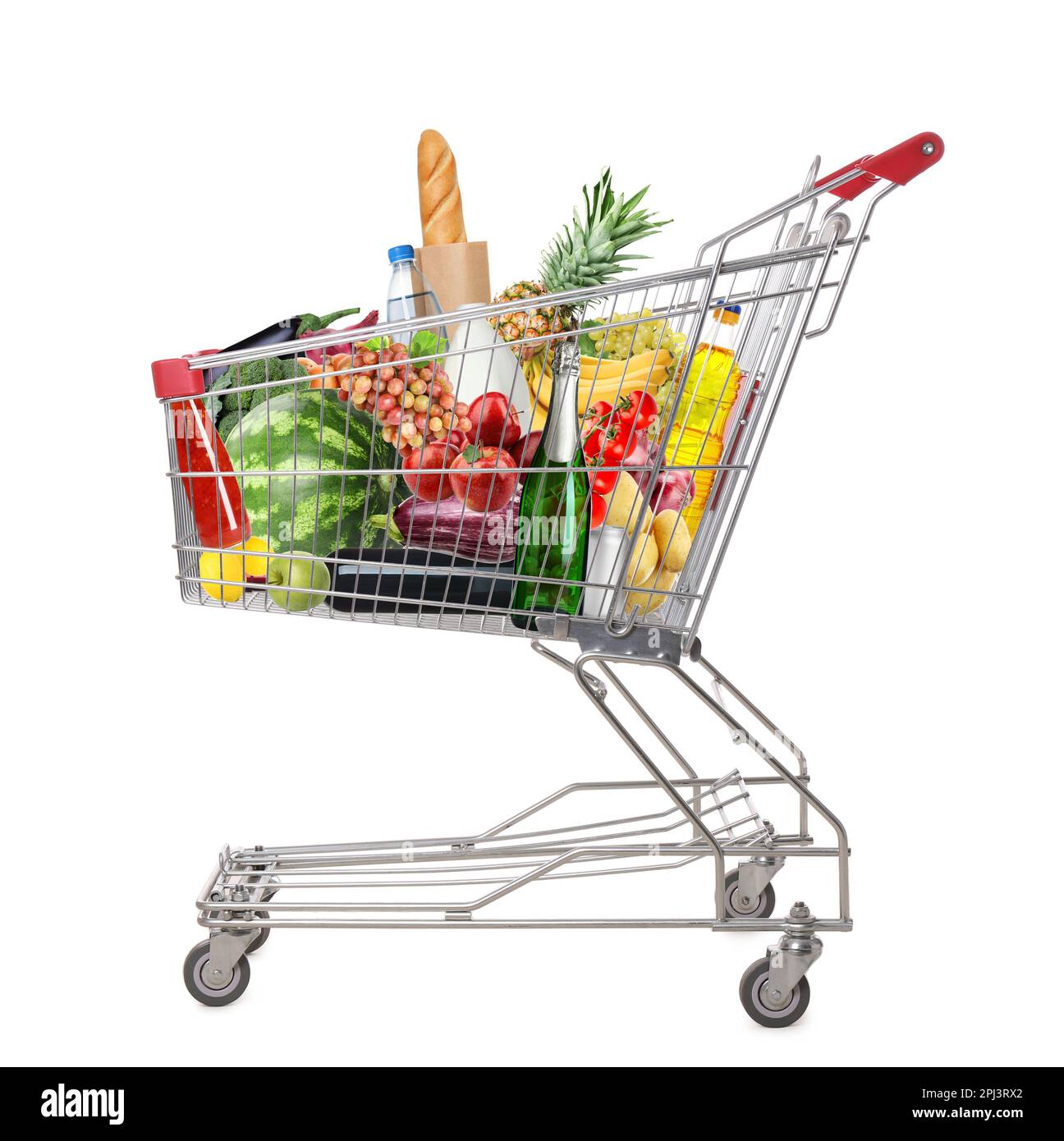 Shopping cart with groceries on white background Stock Photo - Alamy