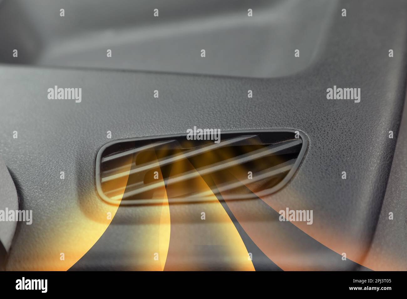 Closeup view of conditioning system in car and illustration of warm air ...