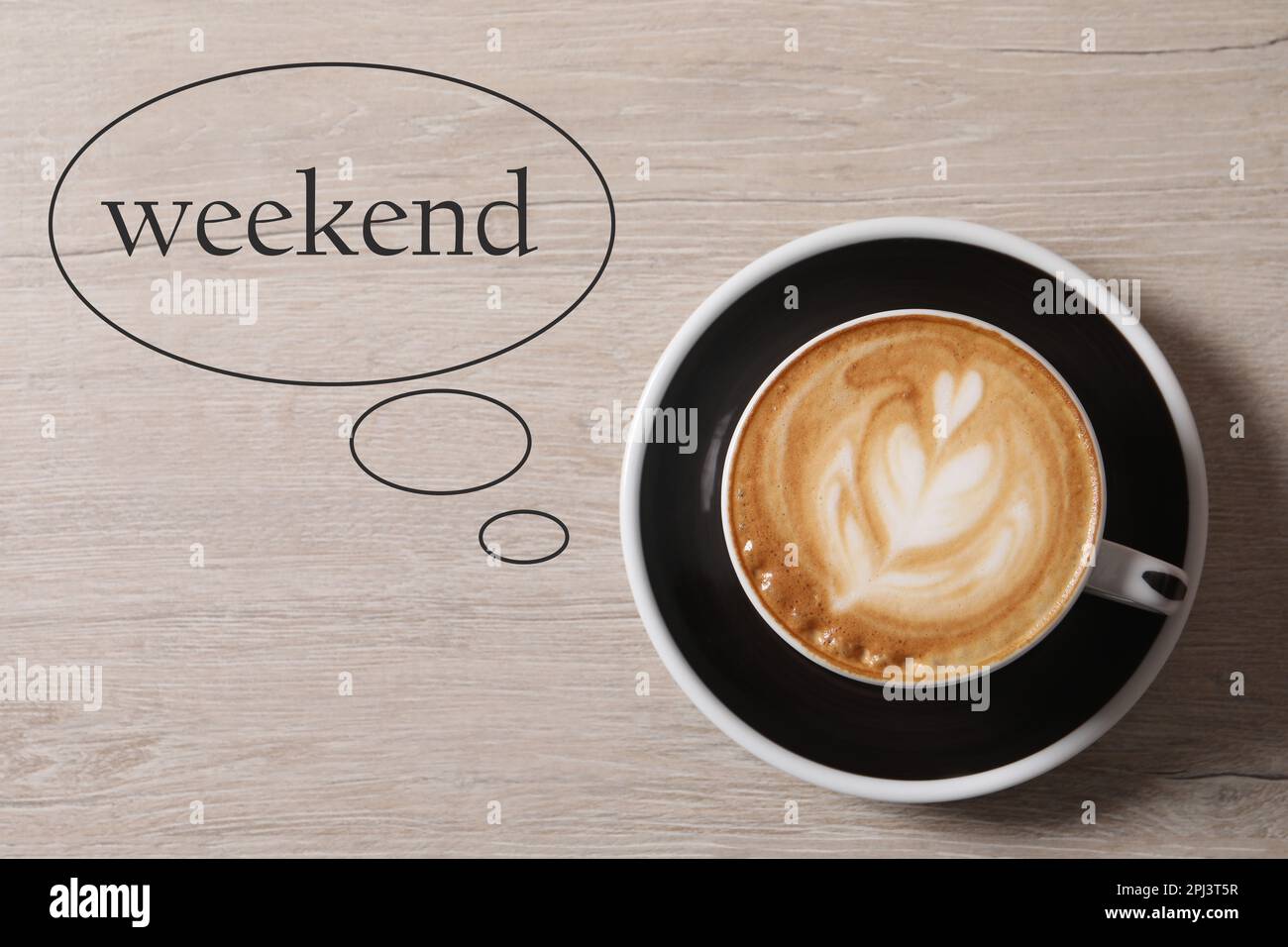 Happy Weekend. Cup of aromatic coffee on wooden table, top view Stock ...