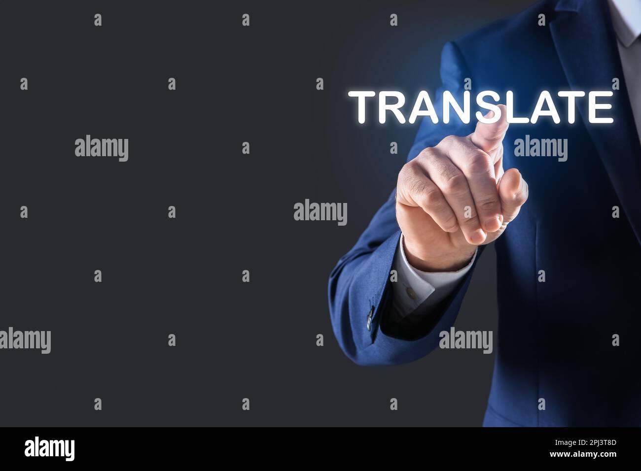 Man pointing at virtual model of word TRANSLATE against grey background ...