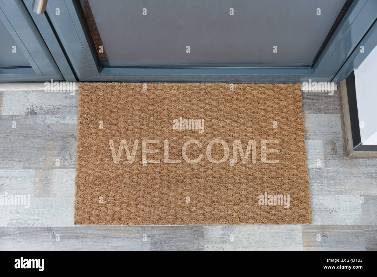 Welcome doorstep feet hi-res stock photography and images - Alamy