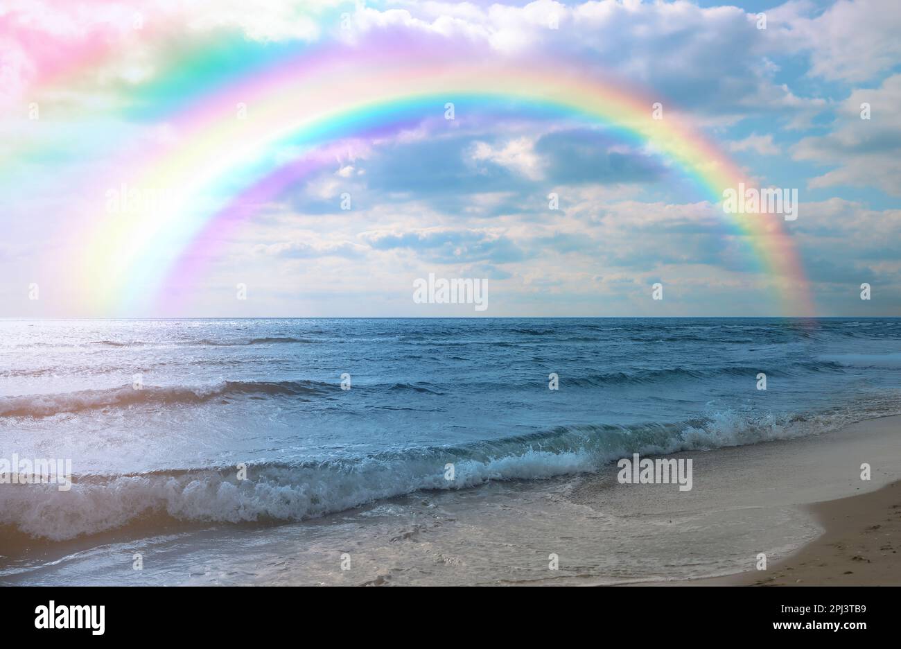 Colorful rainbow in sky over hi-res stock photography and images - Alamy