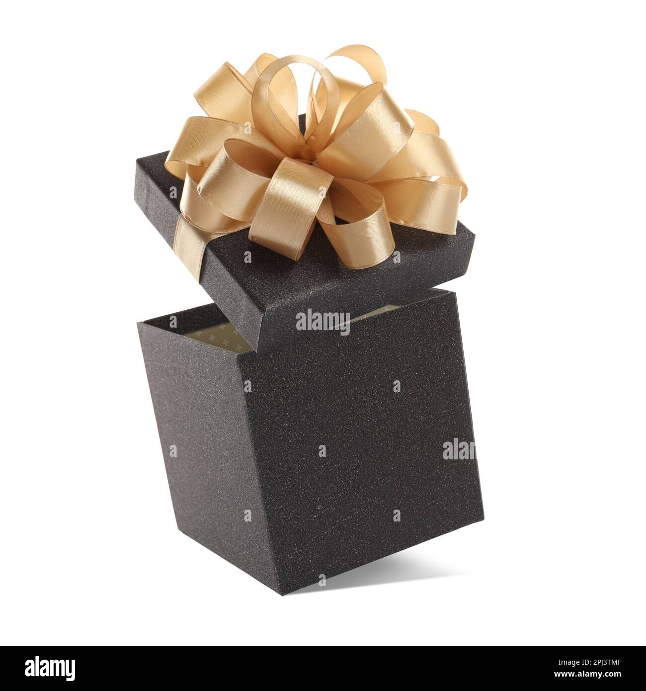 Beautiful black gift box with golden bow on white background Stock ...