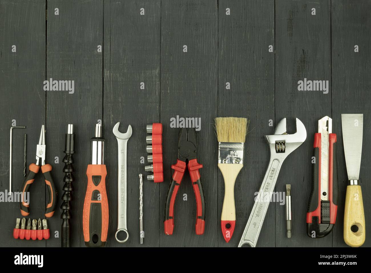 Tools on a rustic background with copy space. Working tools on a wooden ...