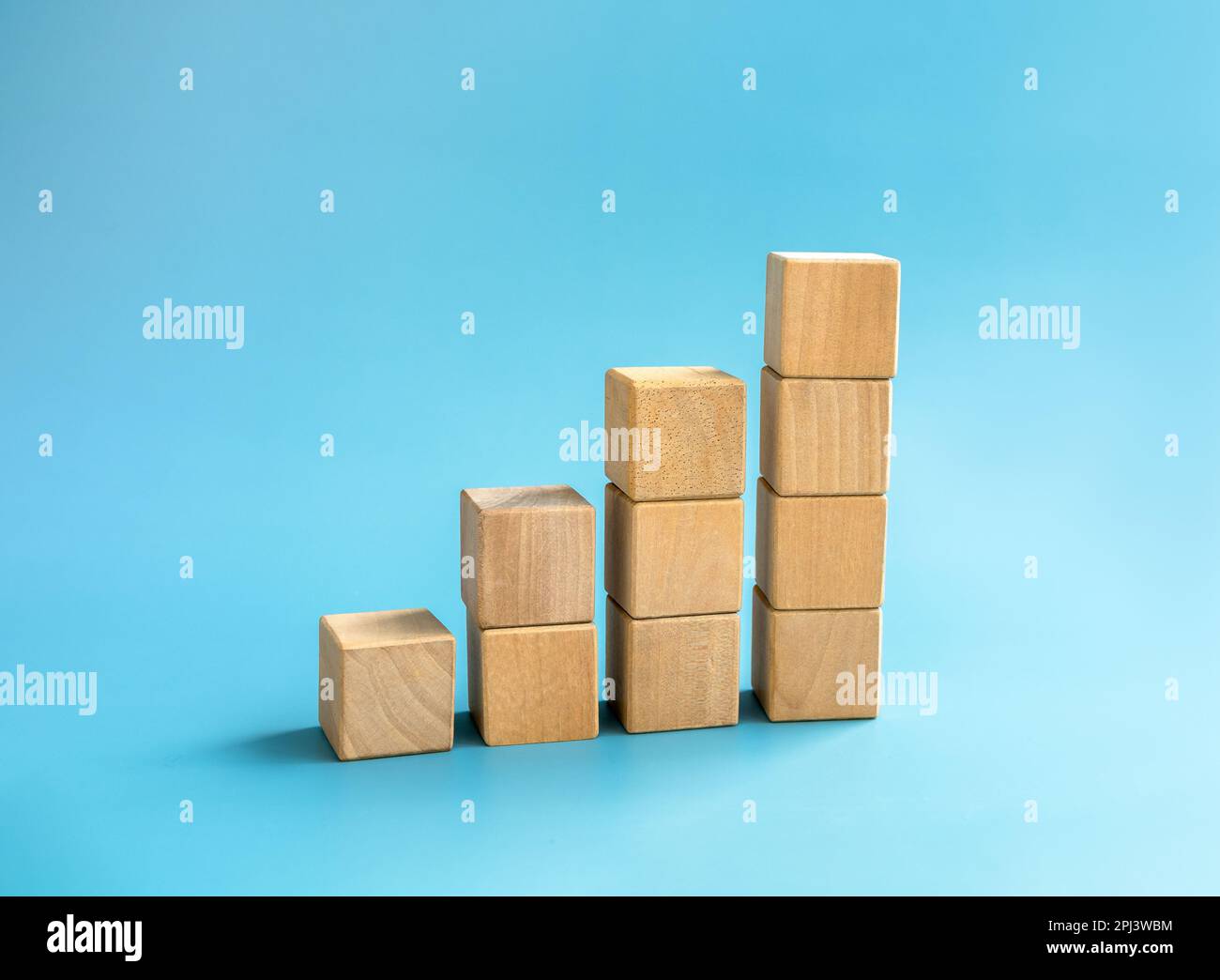 Blank wooden cube blocks bar graph chart steps, isolated on blue ...
