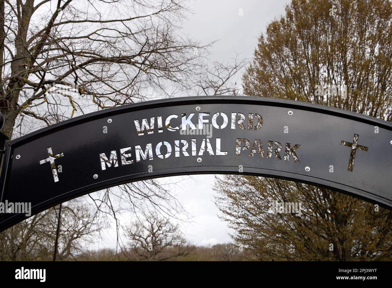 Stencil lettering on a metal sign marking the entrance to Wickford ...