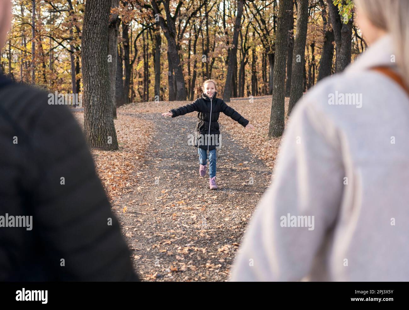 Children running parents hi-res stock photography and images - Alamy