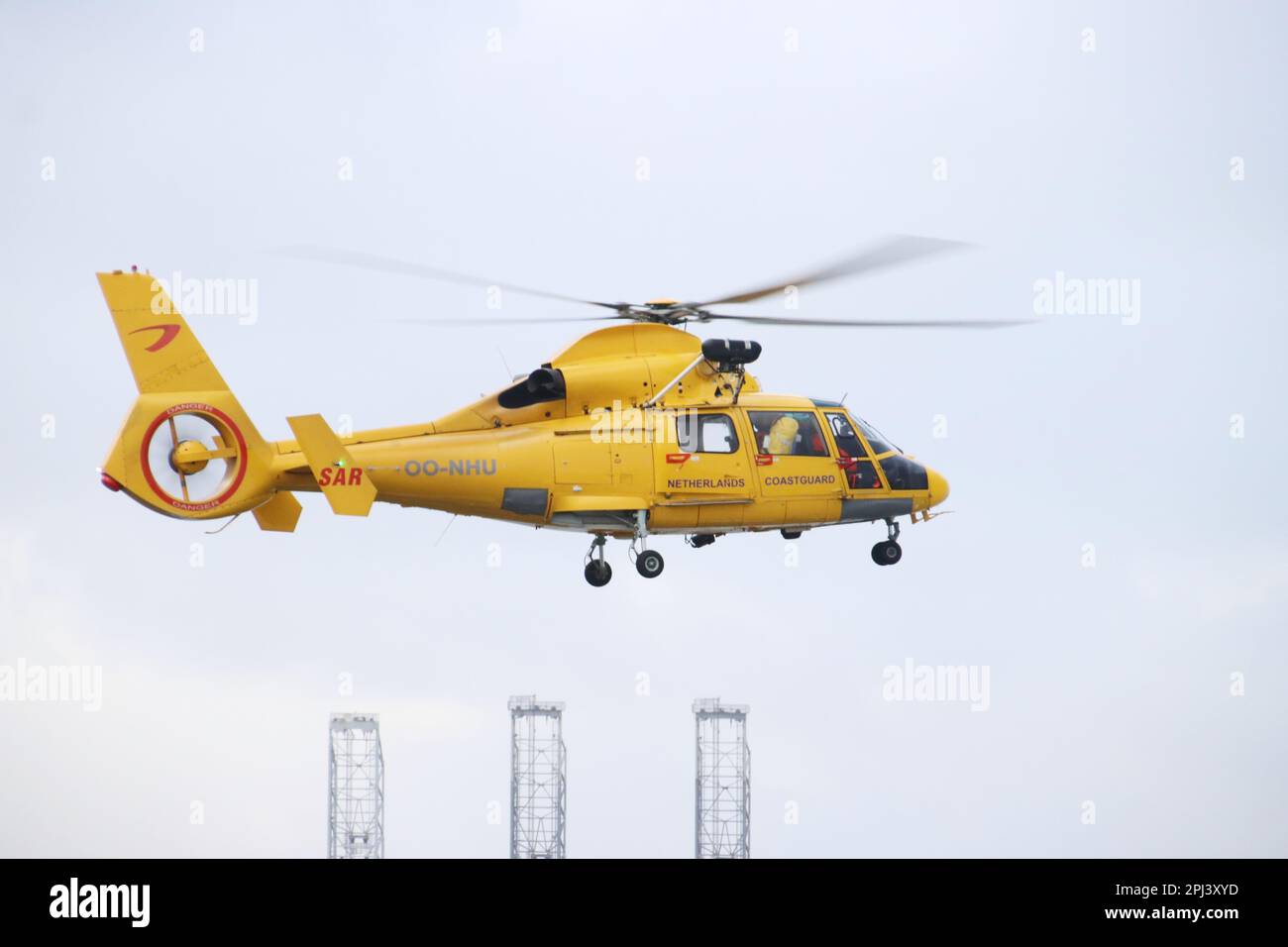 Coastguard helicopter takes off in the Pistolhaven of Rotterdam ...