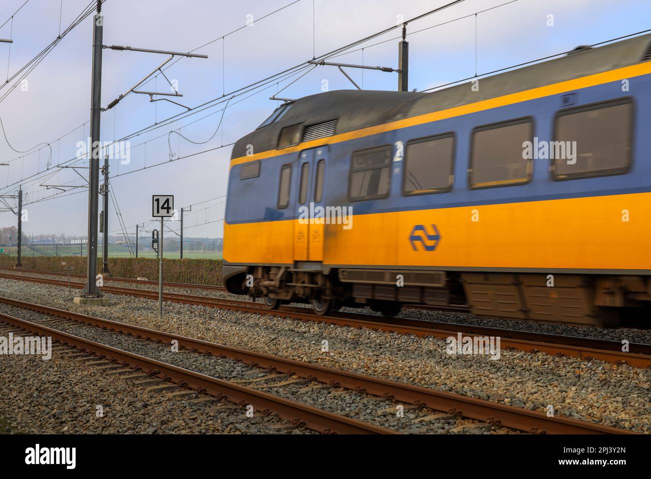Red steel bridge called Hanzeboog over the river IJssel between Hattem ...