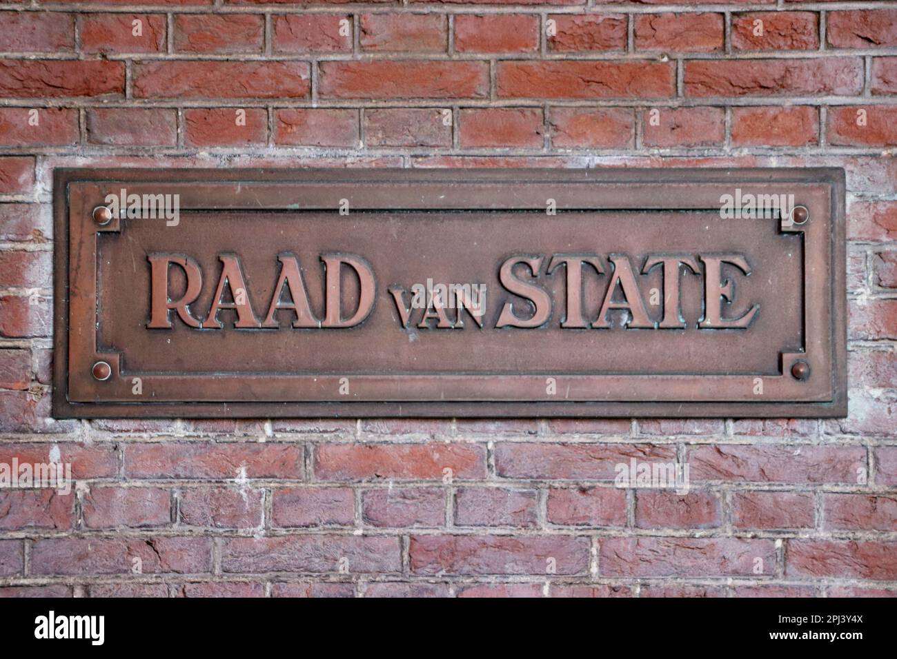 Copper sign with Council of State (Raad van State) on the wall at the ...