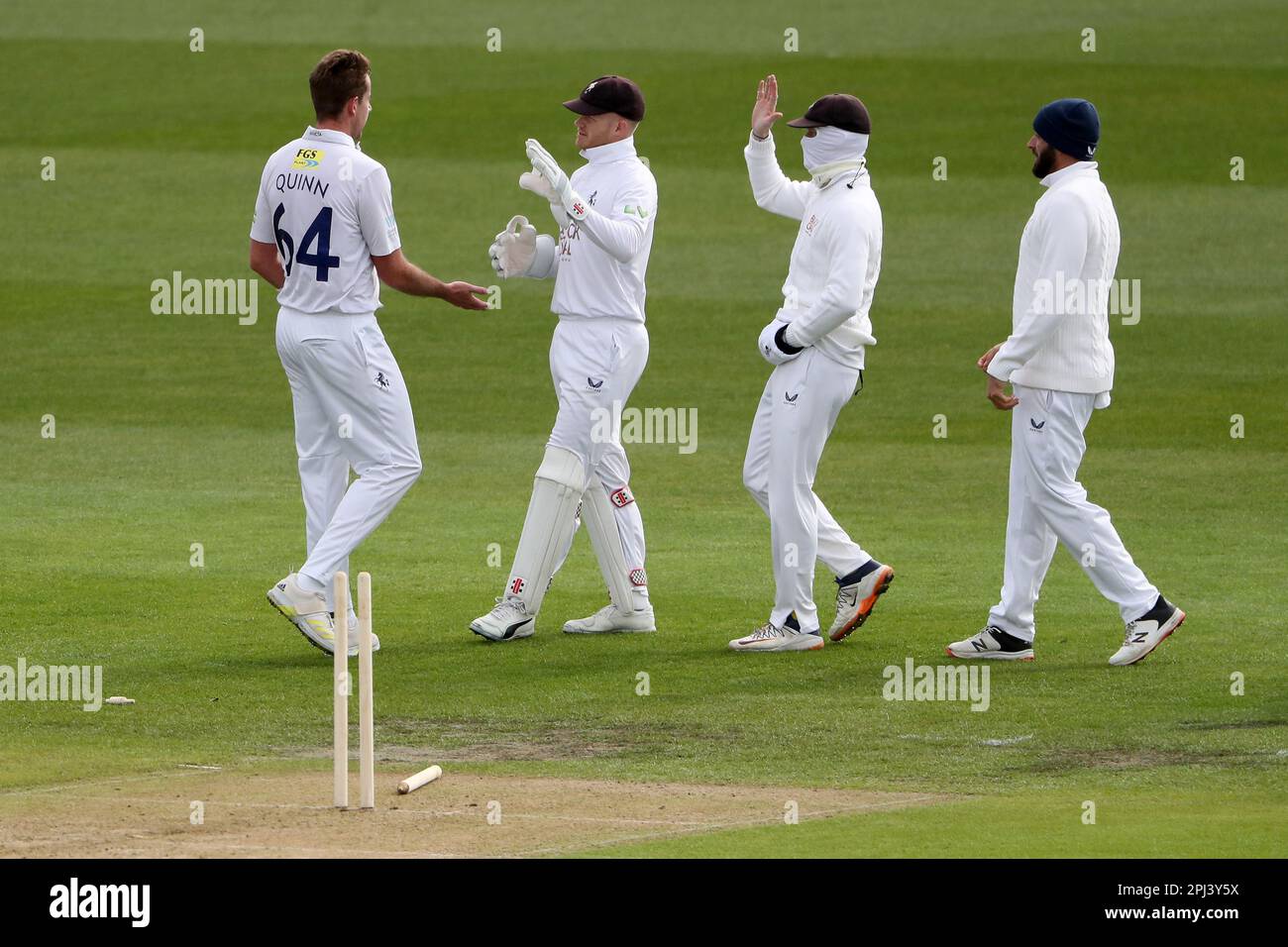 Matt Quinn of Kent celebrates with his team mates after taking the ...