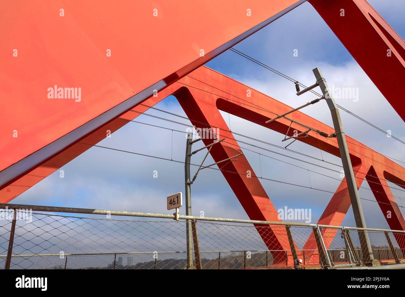 Red steel bridge called Hanzeboog over the river IJssel between Hattem ...