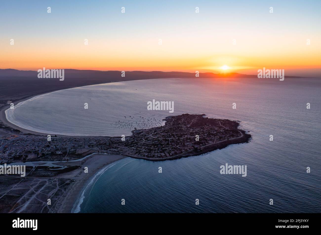 An aerial view of a seaside town at sunset Stock Photo - Alamy