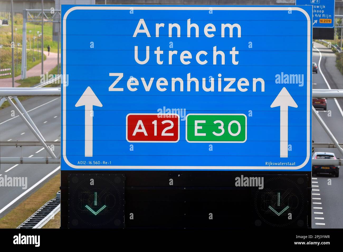 Blue signpost on the highway A12 direction to Arnhem, Utrecht and ...
