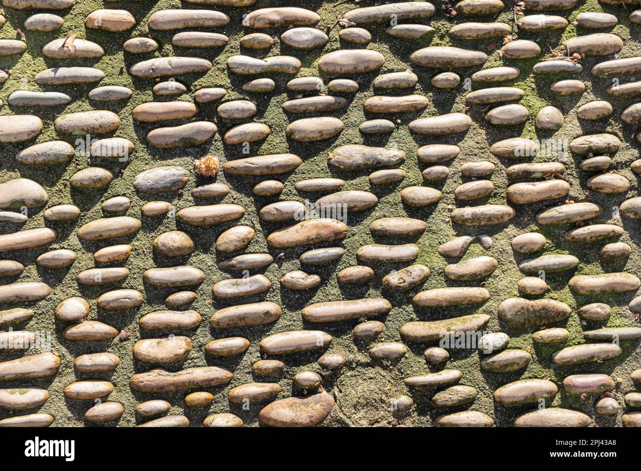 cobblestone paving in a Spanish city square Stock Photo - Alamy