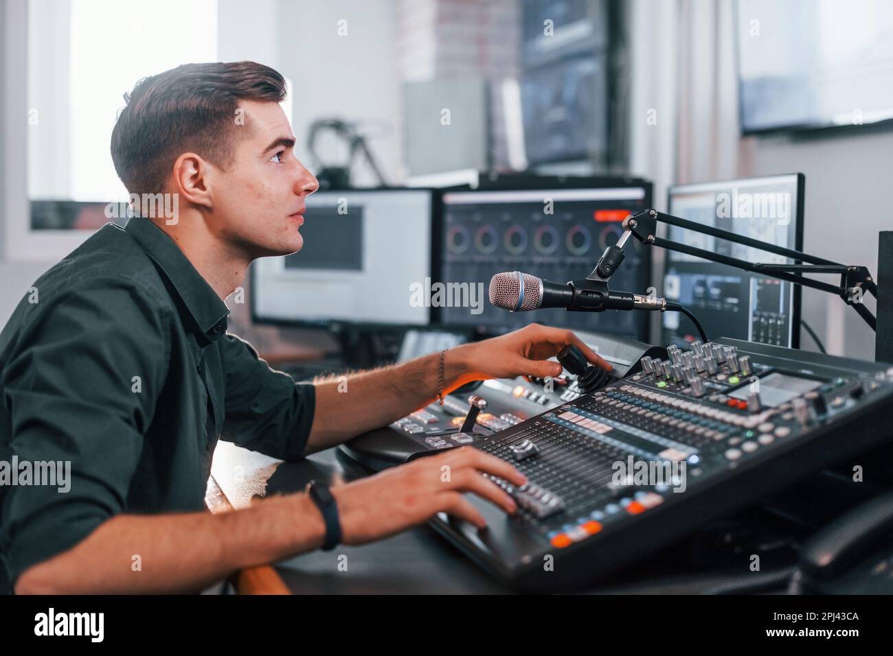 Radio host in studio interview hi-res stock photography and images - Alamy