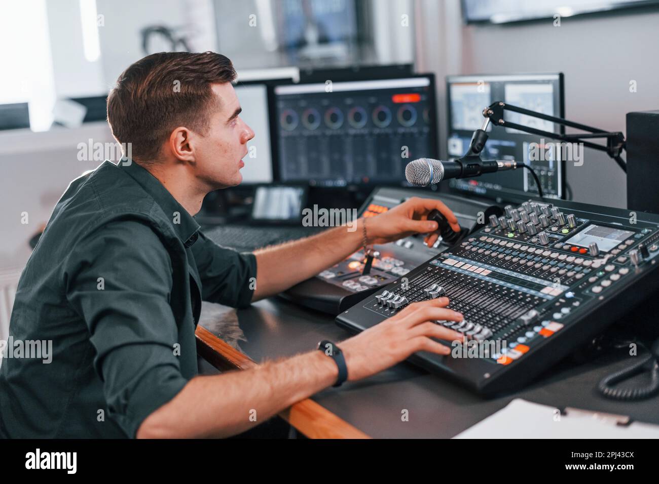 Radio host in studio interview hi-res stock photography and images - Alamy