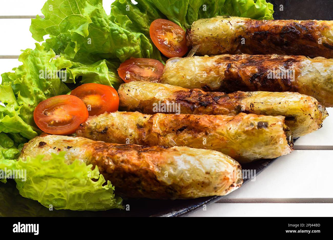 Traditional fried vietnamese spring rolls with pork, rice paper on ...