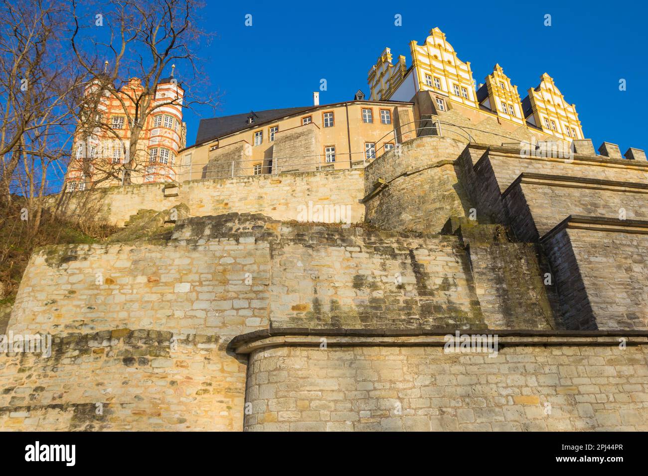 Massive wall of the historic castle in Bernburg, Germany Stock Photo ...