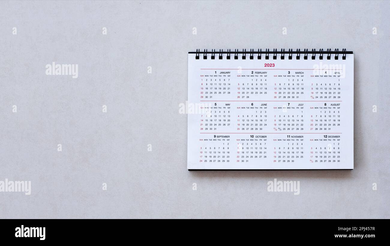 white calendar on gray background Stock Photo - Alamy