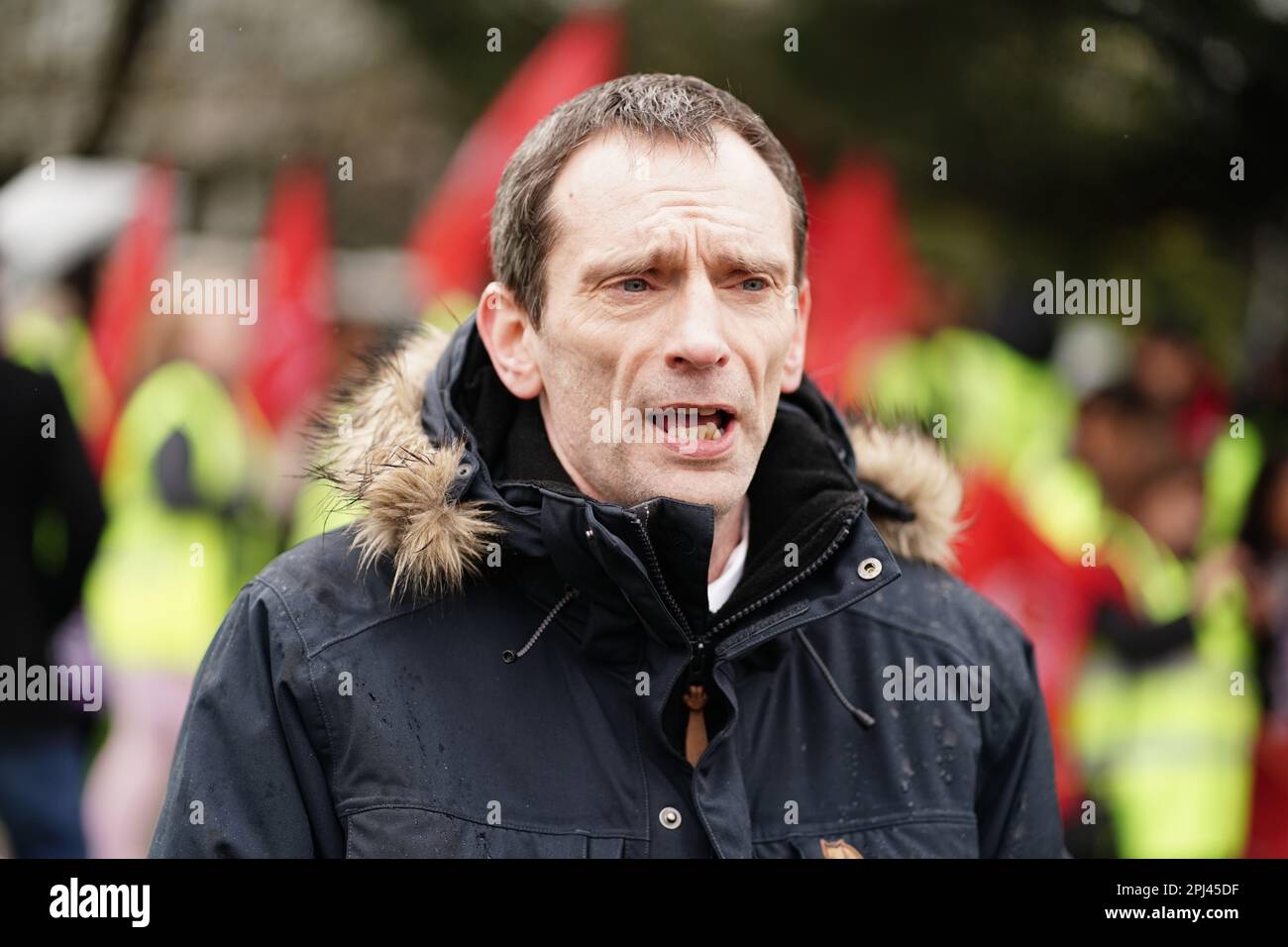 Unite regional co-ordinating officer Wayne King speaking to the media ...