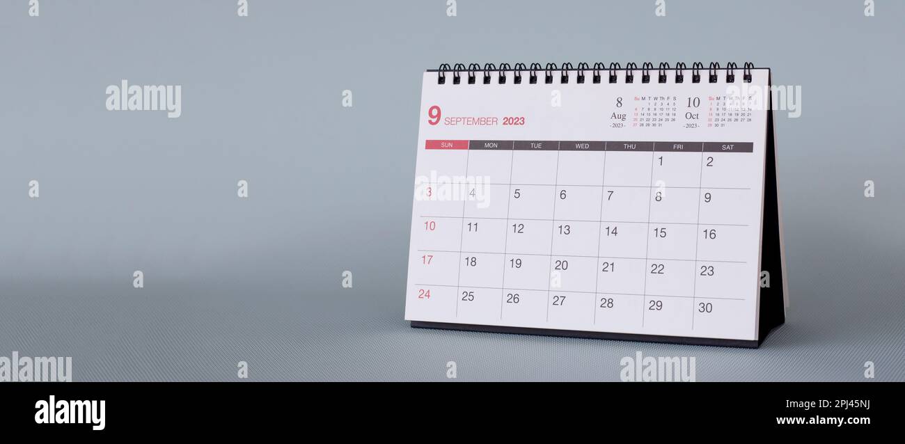 white calendar on gray background Stock Photo - Alamy