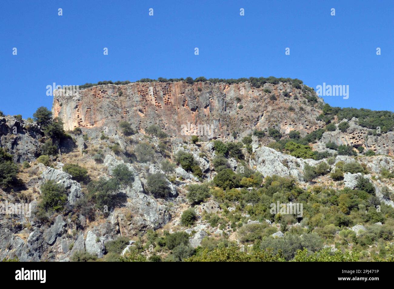 Turkey, Lycia, Pinara: a cliff face with over 900 rock burial chambers ...